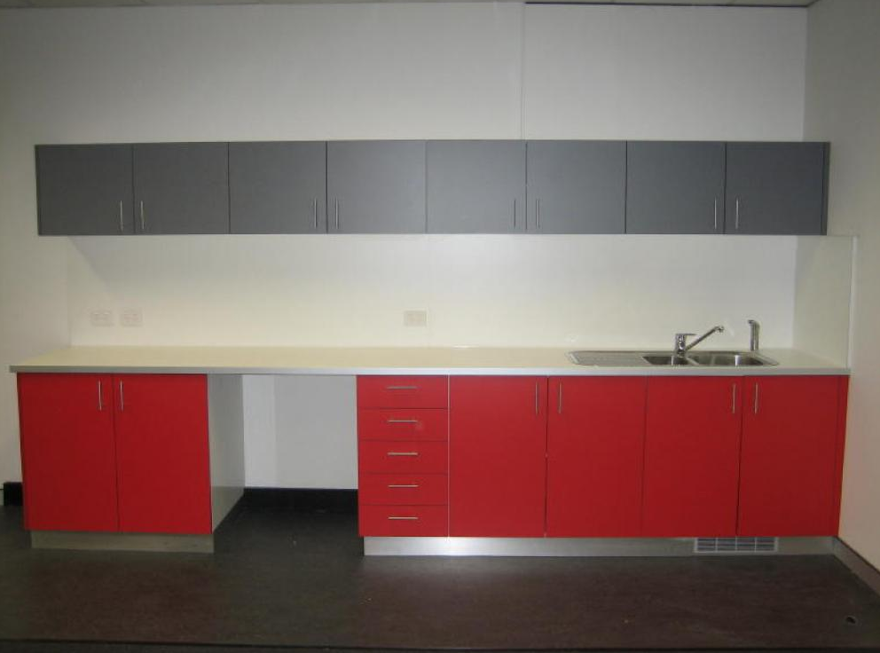 Laminated Commercial Kitchenette With Stainless Kicks | Tasker Joinery