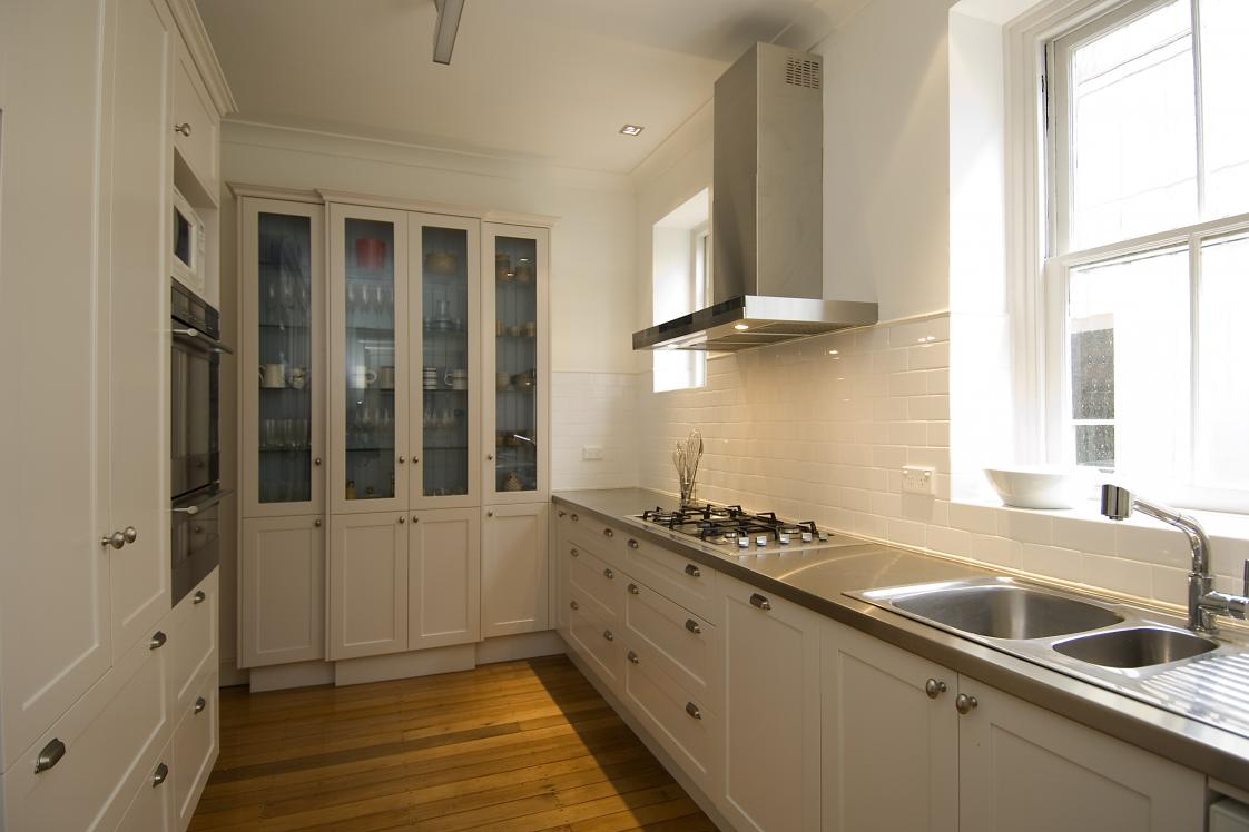 Polyurethane Kitchen With Recessed Doors And Stainless Tops | Tasker ...